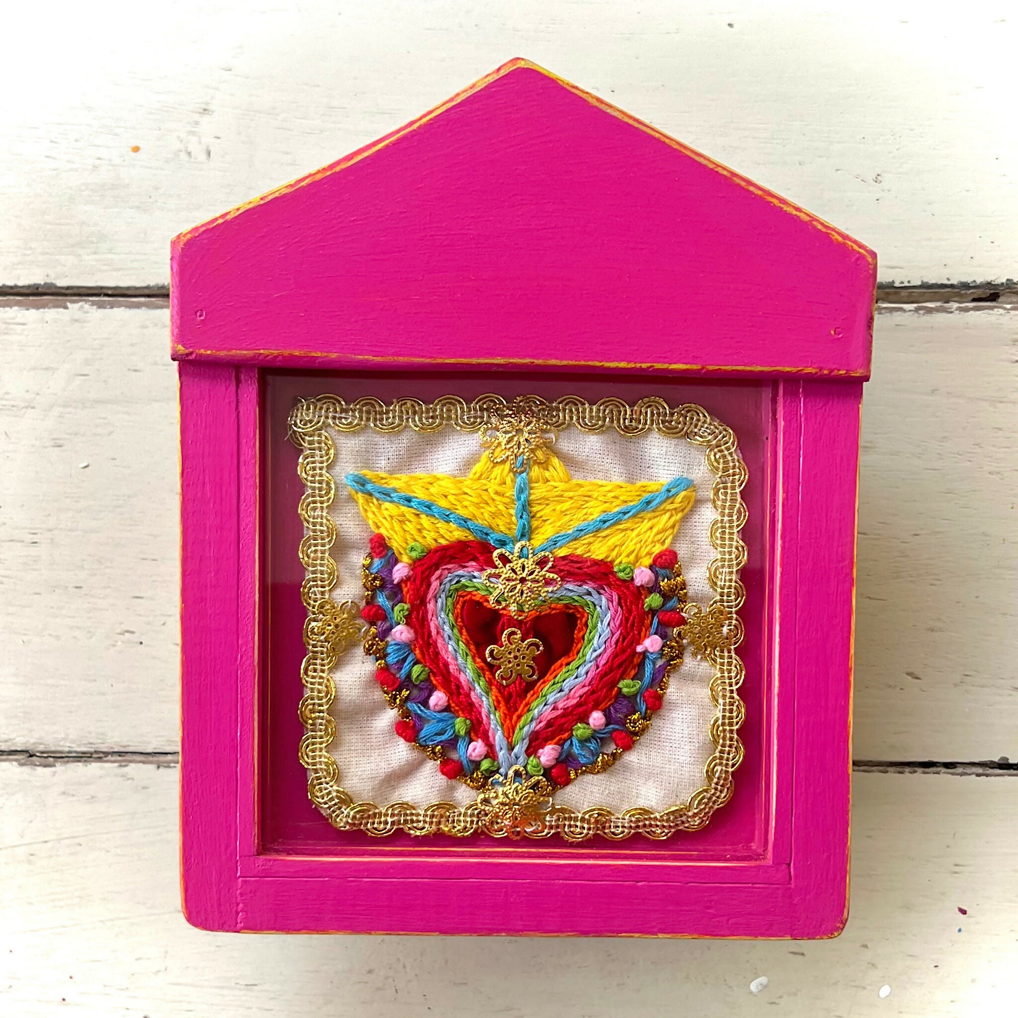 Sacred Protector Altarpiece fuchsia 1 – This Is Latin America